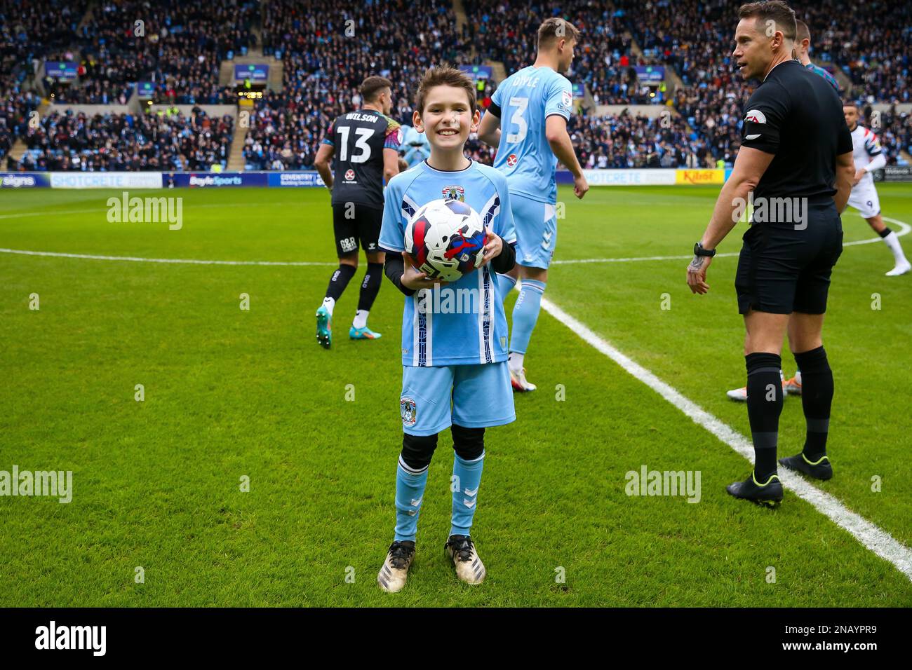 A match day mascot holds a ball on the pitch ahead of the Sky Bet ...