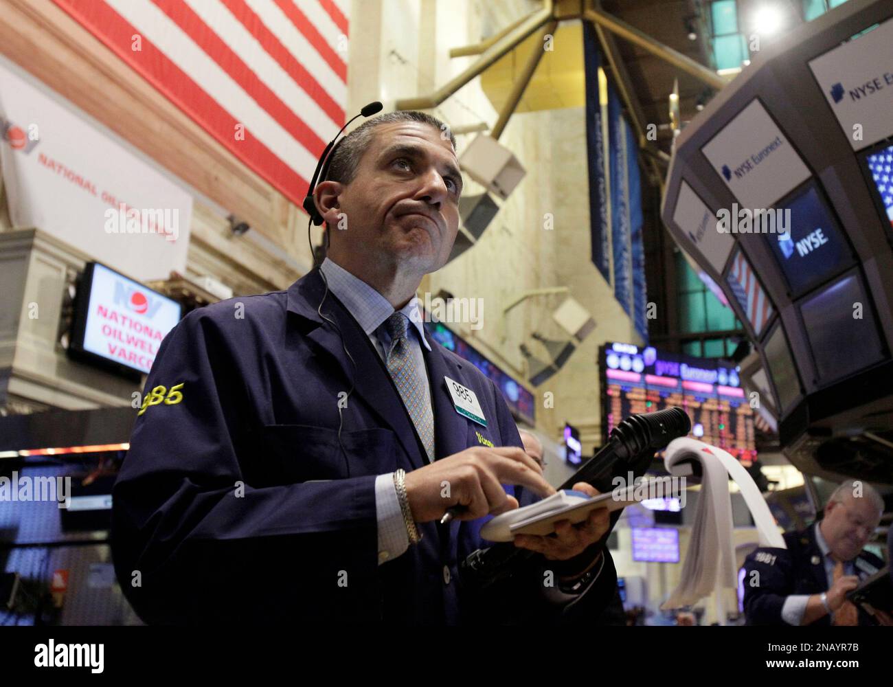 Trader Vincent Quinones works on the floor of the New York Stock ...