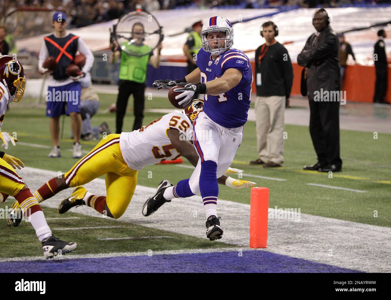 Buffalo Bills' Scott Chandler (84) scores a touchdown under pressure ...
