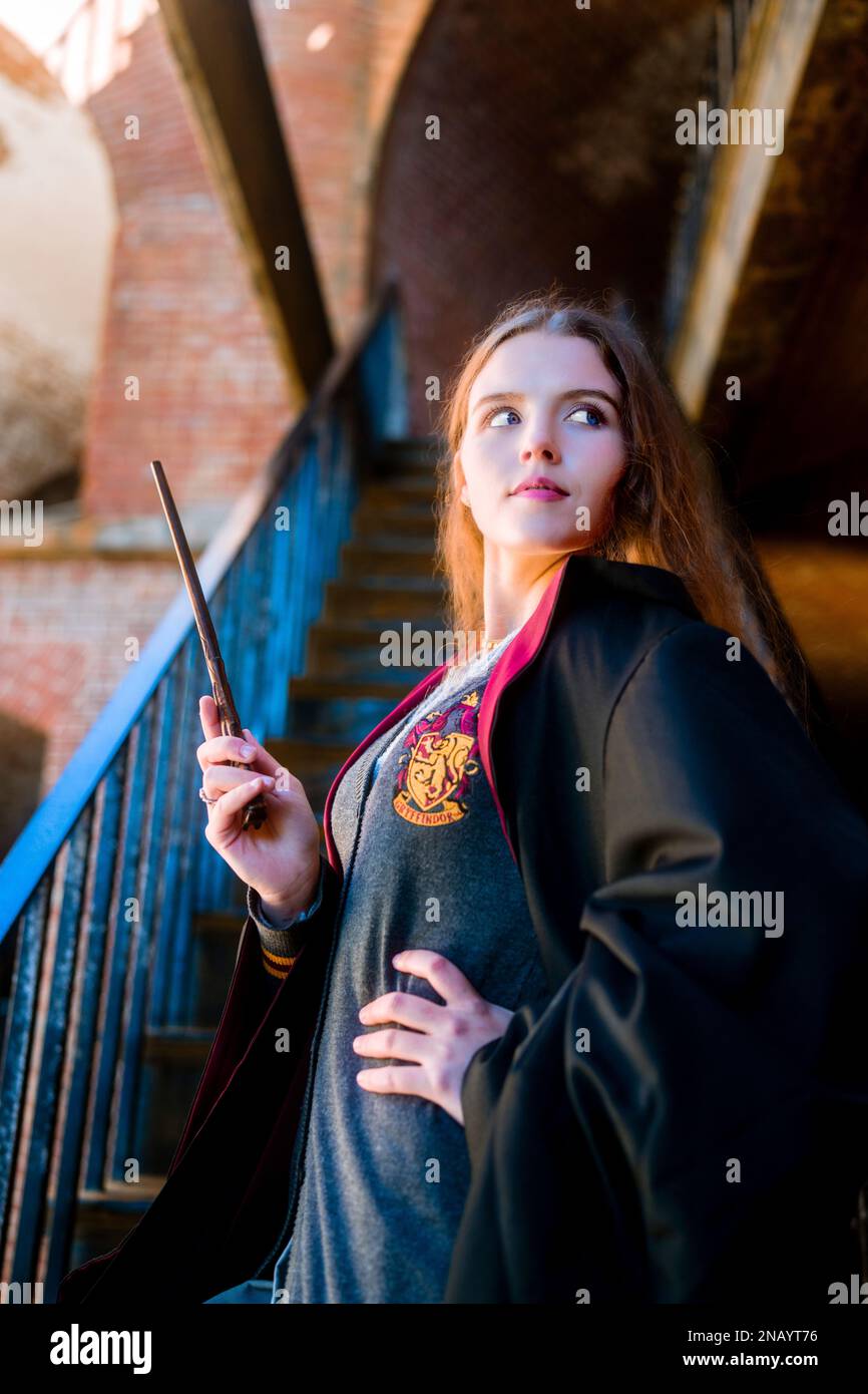 Beautiful Young Gryffindor Witch Standing on iron stairway Stock Photo ...