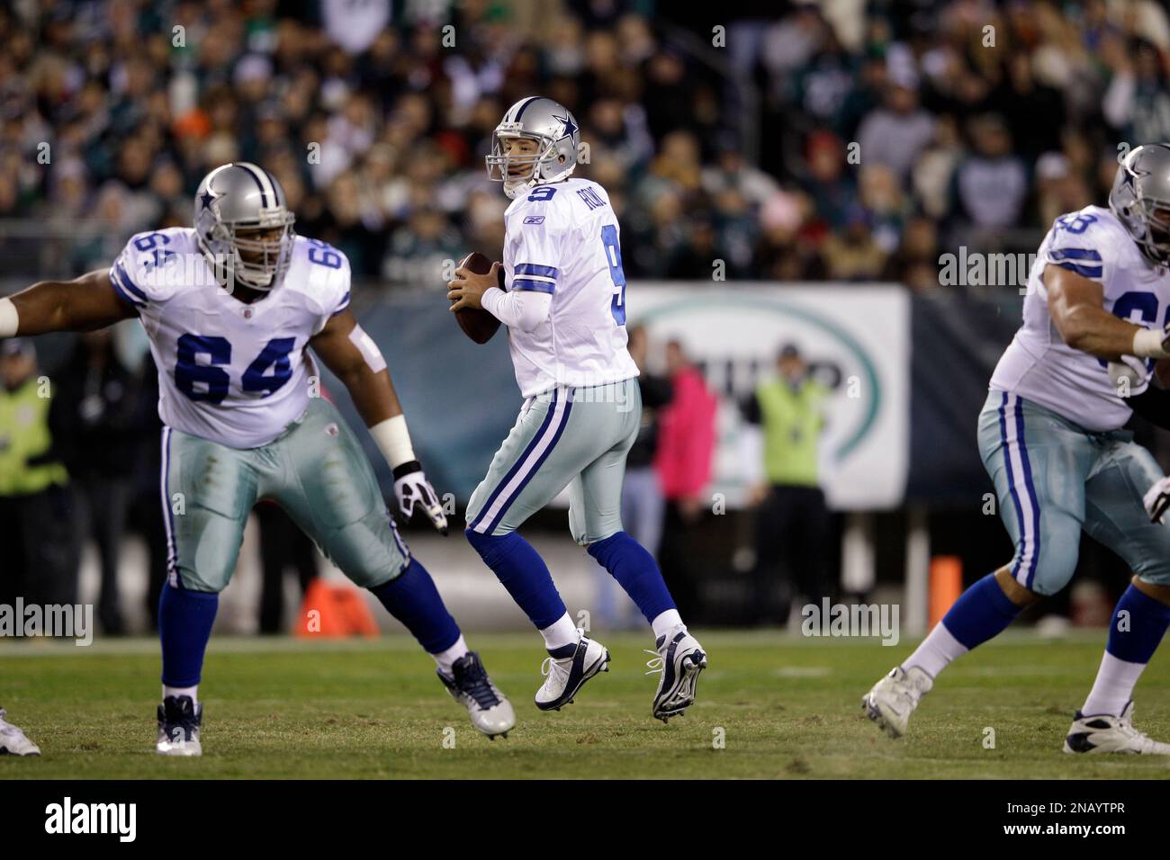 Dallas Cowboys' Tony Romo looks to throw a pass during an NFL football ...