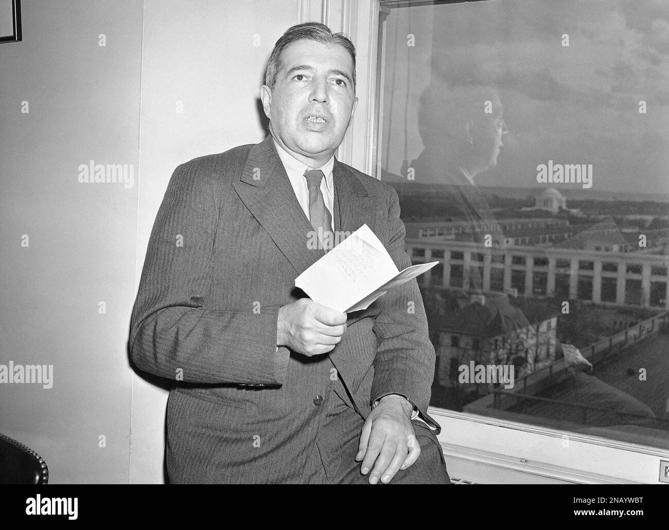 Mike Straus in his Washington office on March 17, 1942, after being ...