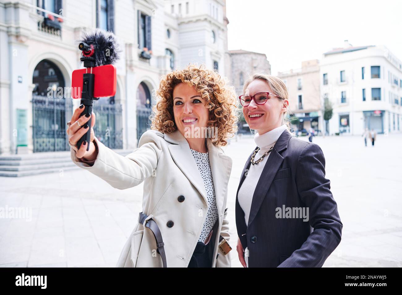 Live streaming on the street hi-res stock photography and images - Alamy