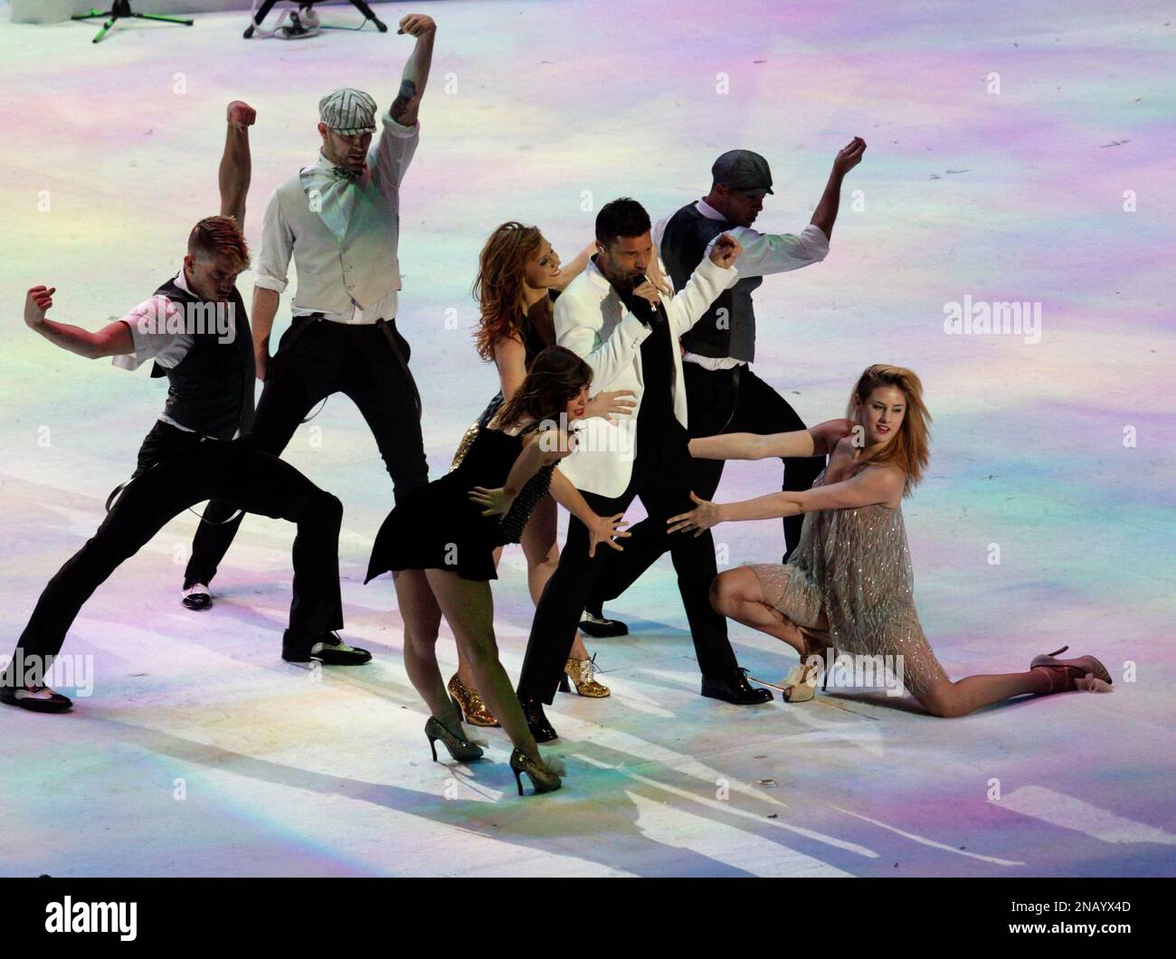 Puerto Rico's singer Ricky Martin, in white jacket, performs during the ...