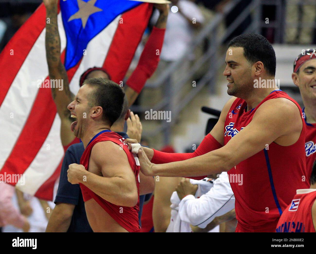Puerto Rico's Jose Barea, left, and Manuel Narvaez celebrate after ...