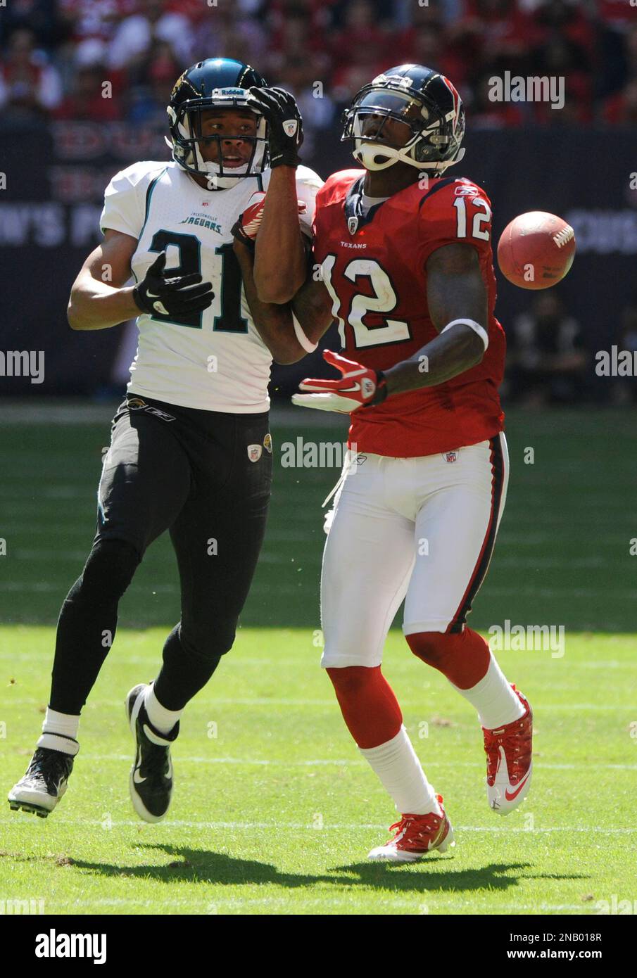 Jacksonville Jaguars cornerback Derek Cox (21) and Houston Texans wide ...
