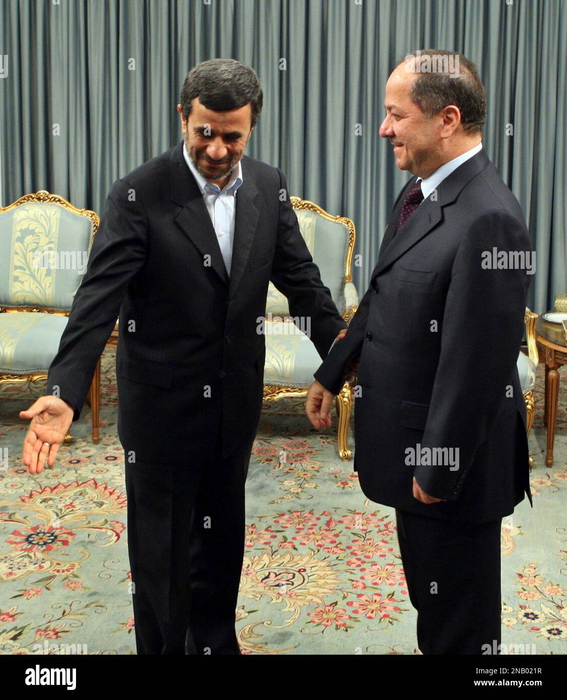 Iranian President Mahmoud Ahmadinejad, left, welcomes Iraqi Kurdish ...