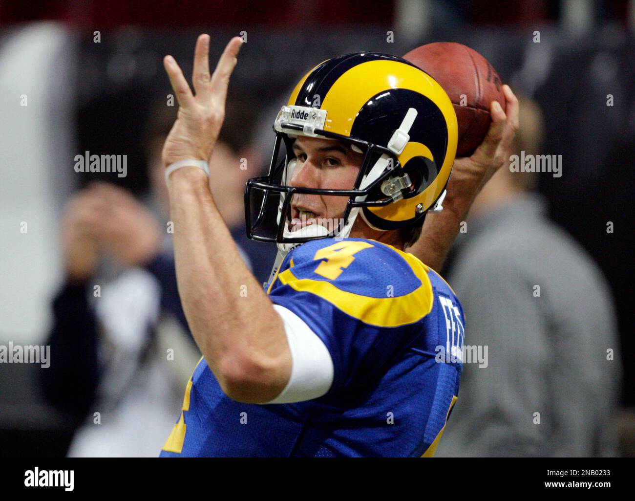 St. Louis Rams quarterback A.J. Feeley (4) warms up before the start of ...