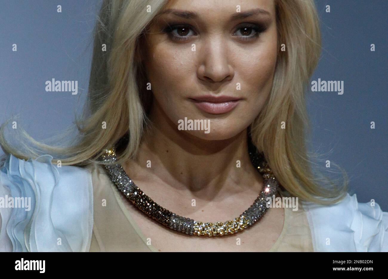 A model displays a creation by Russian designer Lisa Romanyuk during ...