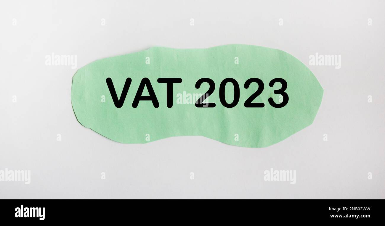 Green paper with the message VAT 2023 on a white background Stock Photo ...
