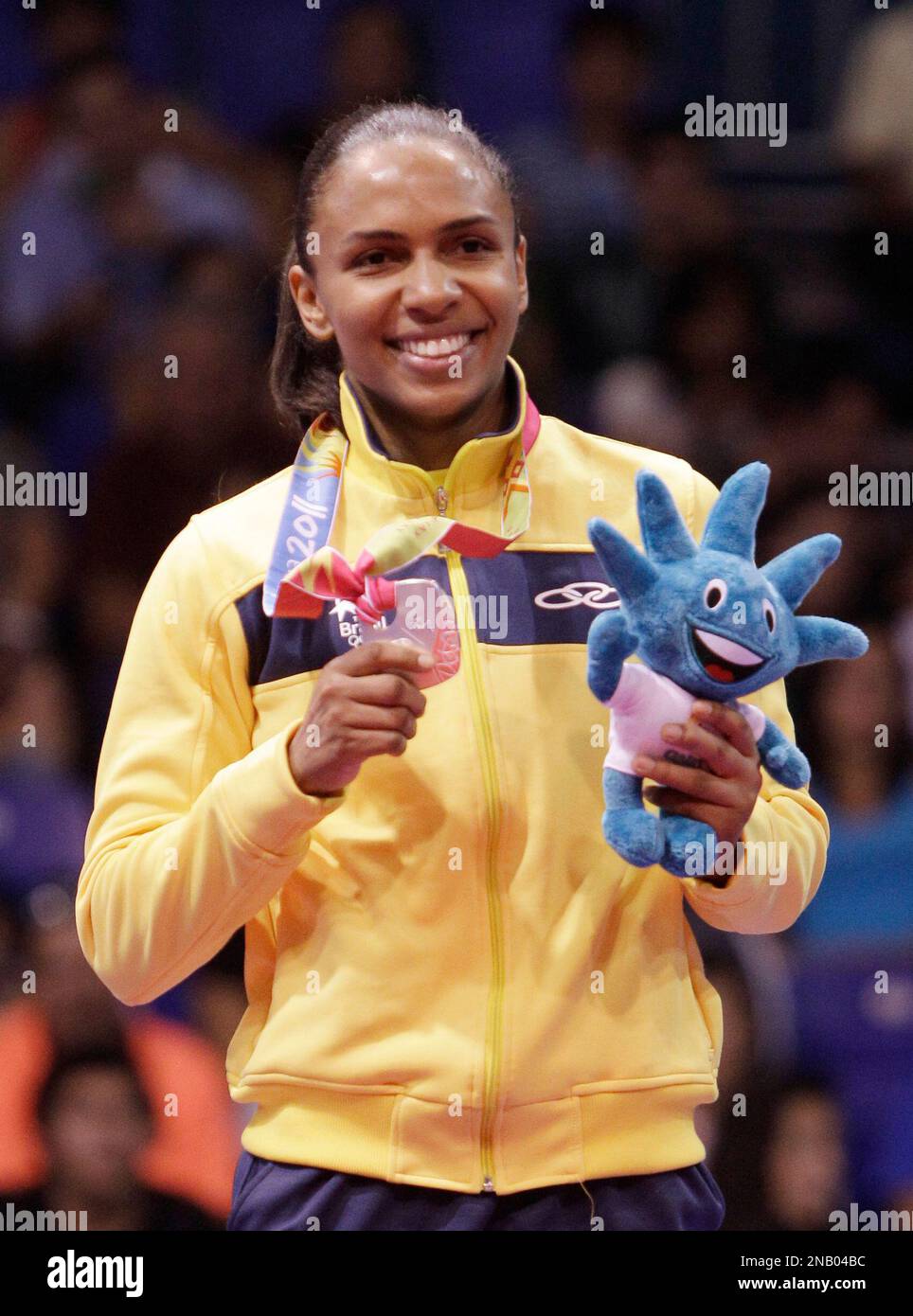 Silver medal Erika Miranda, from Brazil, celebrates during the judo ...