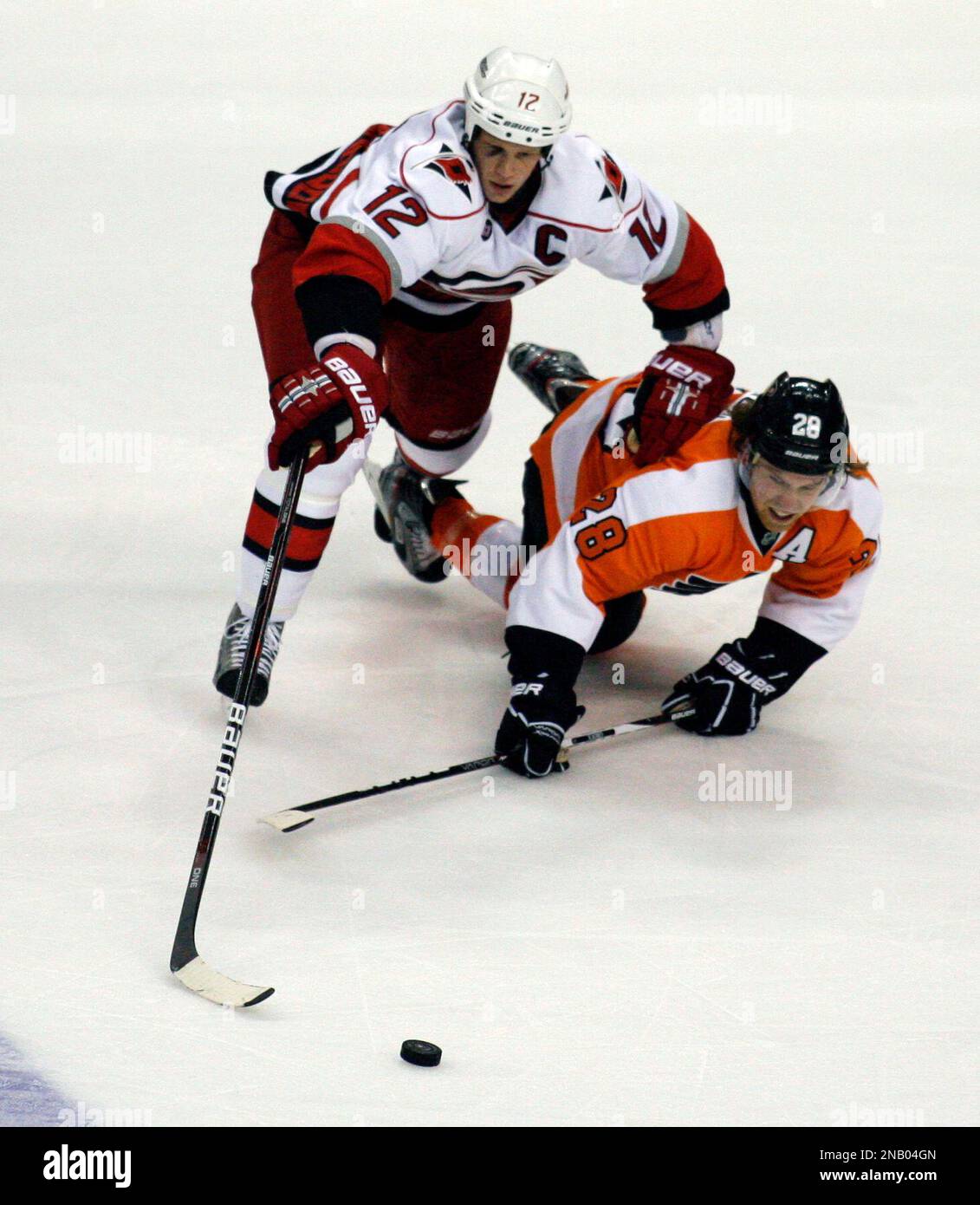 Carolina Hurricanes' Eric Staal (12) and Philadelphia Flyers' Claude ...