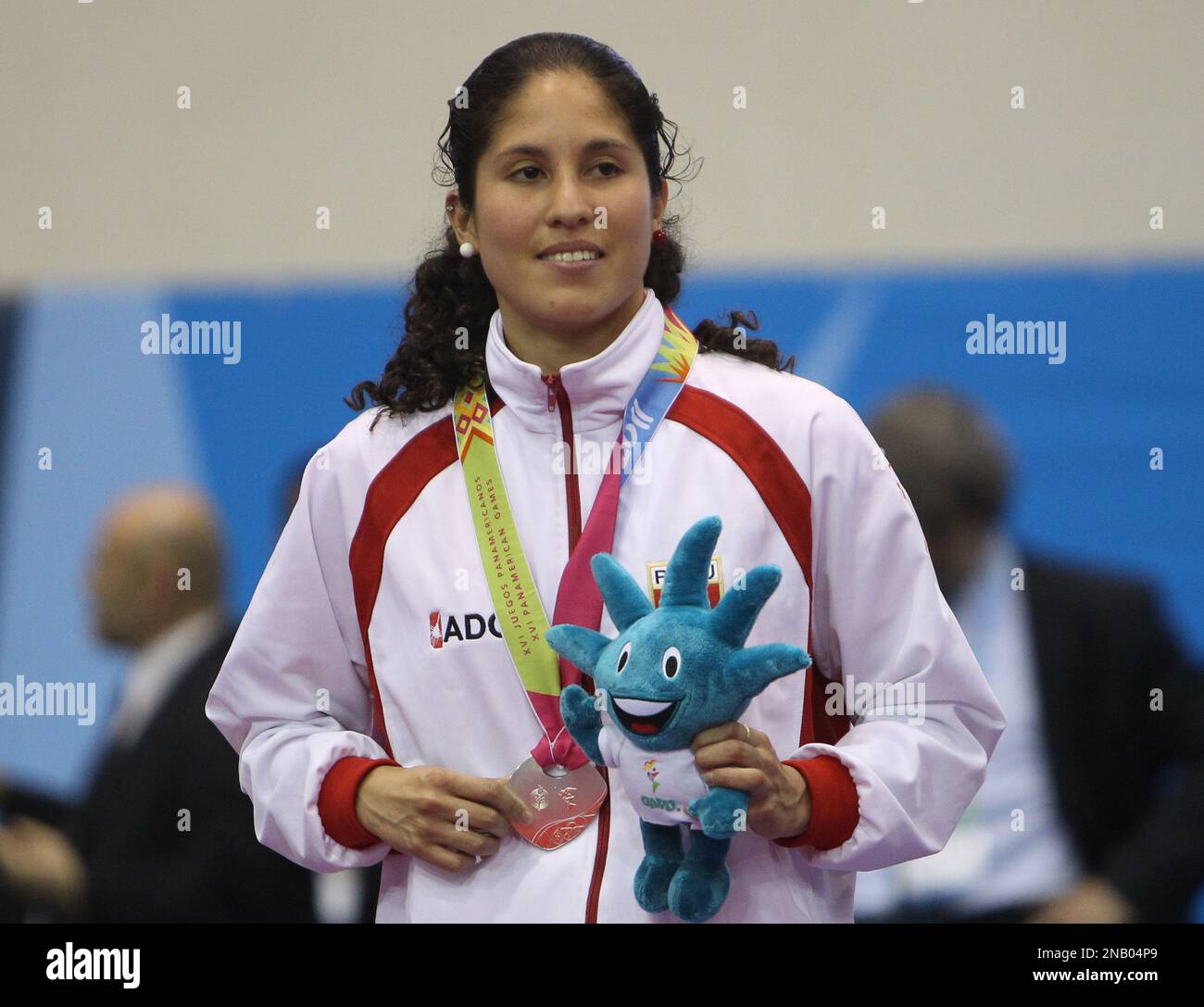 Peru's Alexandra Grande poses with her silver medal during the award ...