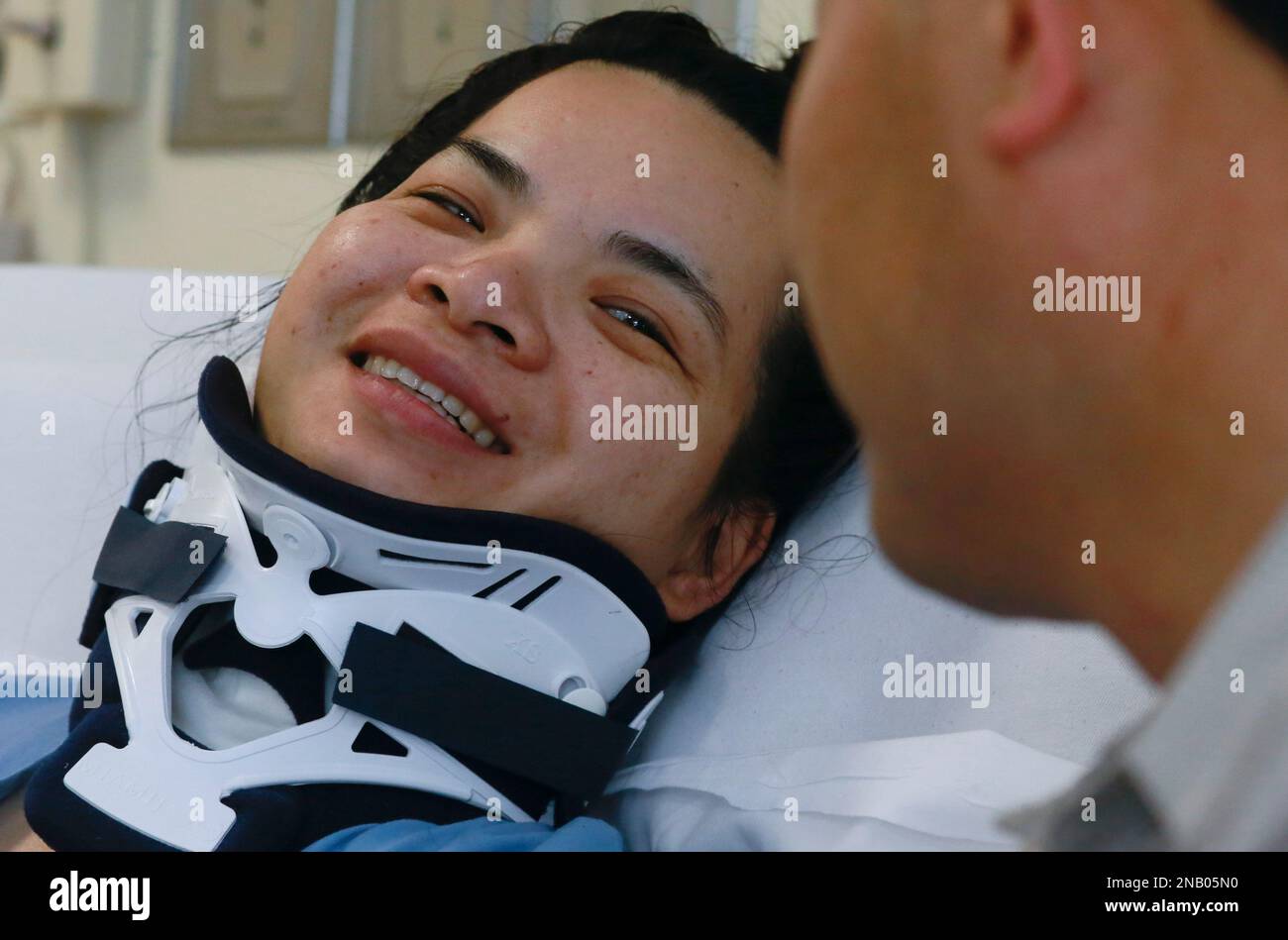 Emma Zhou smiles at her husband Tony Tan at Laguna Honda Hospital in ...