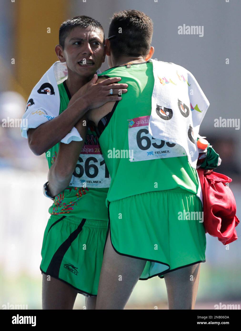Mexico's Jose Ojeda, left, embraces Mexico's Horacio Nava after ...