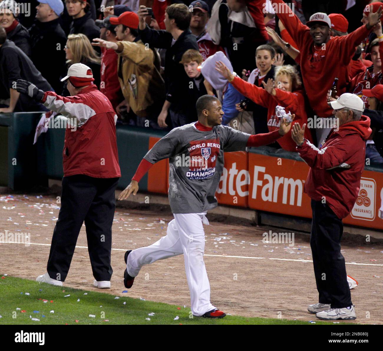 St. Louis Cardinals' Adron Chambers celebrates on the field after his ...
