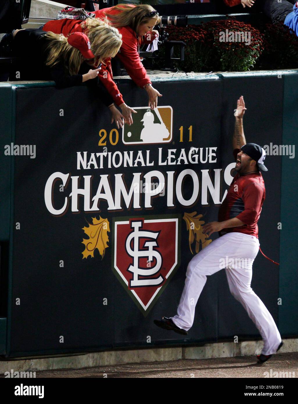St. Louis Cardinals' Gerald Laird celebrates on the field after his ...