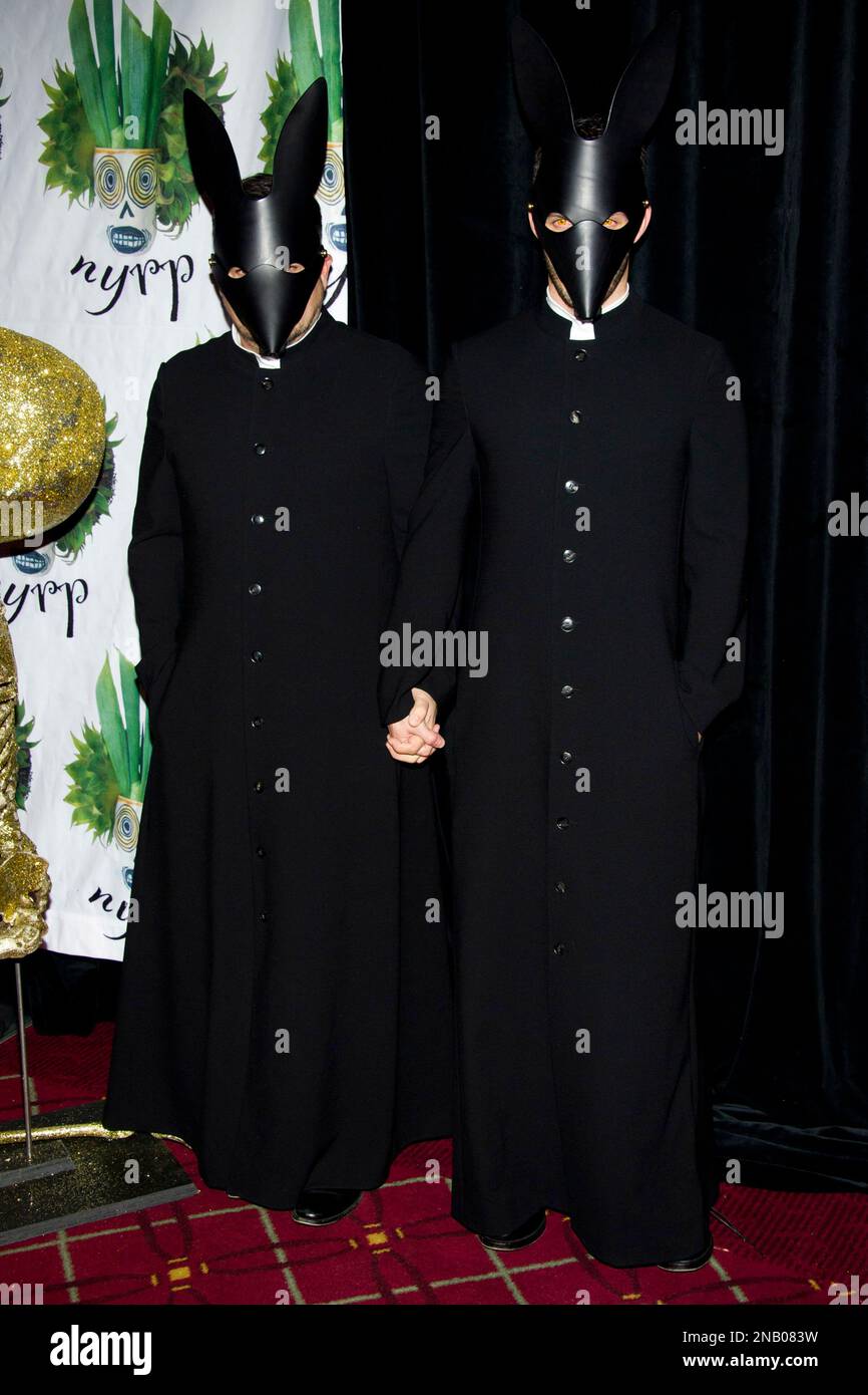 Narciso Rodriguez, left, and guest attend Bette Midler's Hulaween gala ...