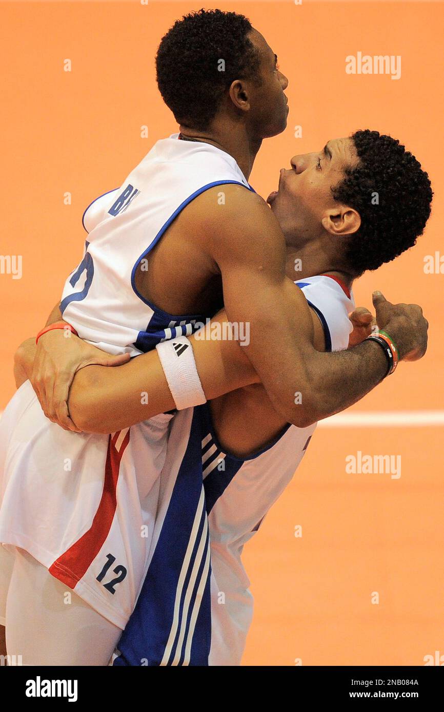 Cuba's Henry Bell, left, and Fernando Hernandez celebrate after beating ...