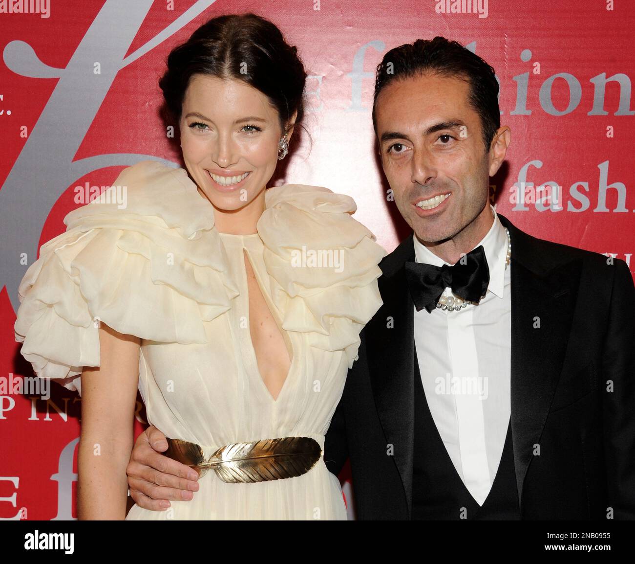 "Star" award honoree, fashion designer Giambattista Valli, right, poses ...