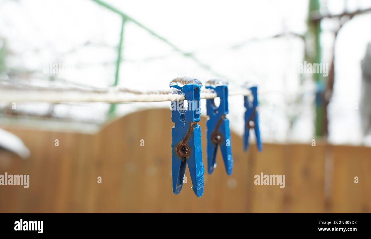Clothespin and Clothes Line with Icicles and Frozen Water Drops Stock ...