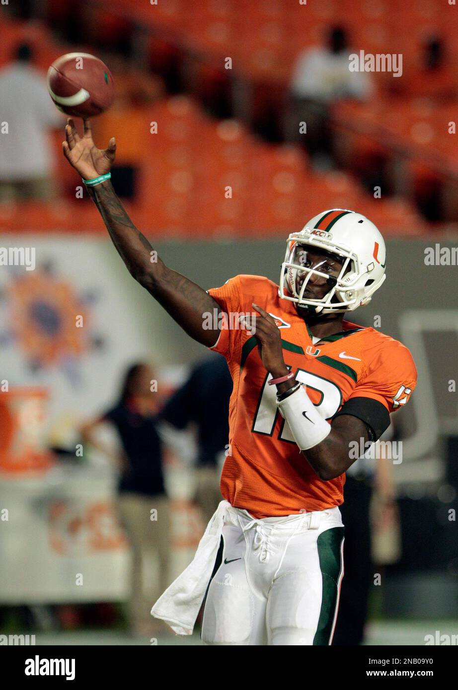 Miami quarterback Jacory Harris (12) is shown during pre-game practice ...