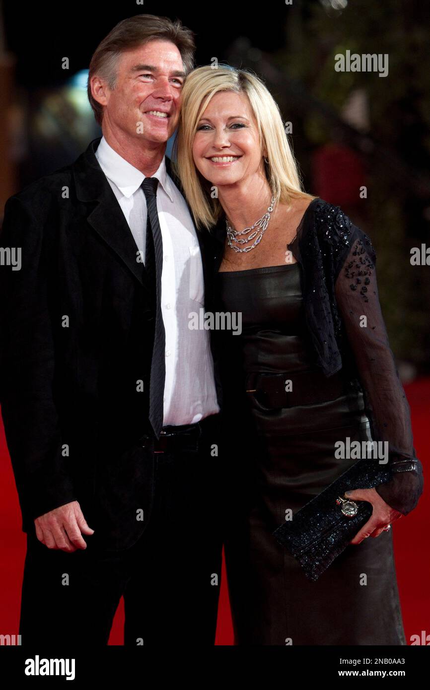 British-born actress Olivia Newton John poses with her husband Amazon John Easterling on the red ...