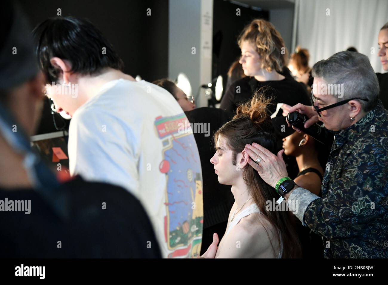 Models prepare backstage at the AKNVAS FW23 Runway Show during New York Fashion Week in New York ...