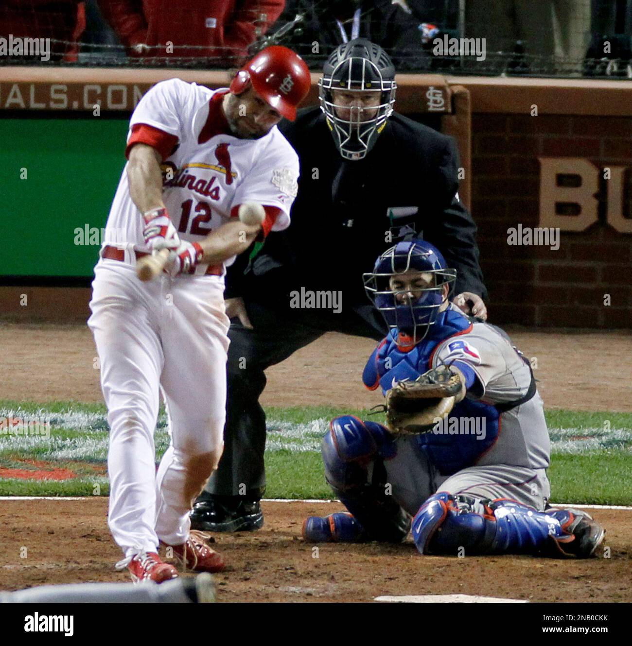 St. Louis Cardinals' Lance Berkman hits a RBI single off a pitch from ...