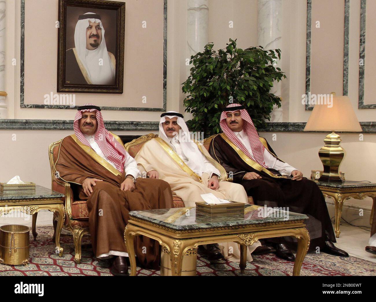 Prince Sultan's sons, Prince Khaled bin Sultan, left, Prince Fahd bin Sultan, center, and Prince ...