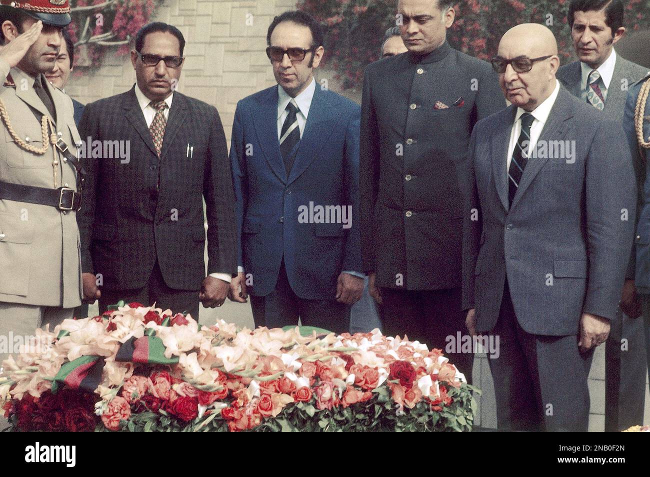 Mohammed Daoud Khan, president of Afghanistan, right, at wreath laying ceremony 1978. Location ...