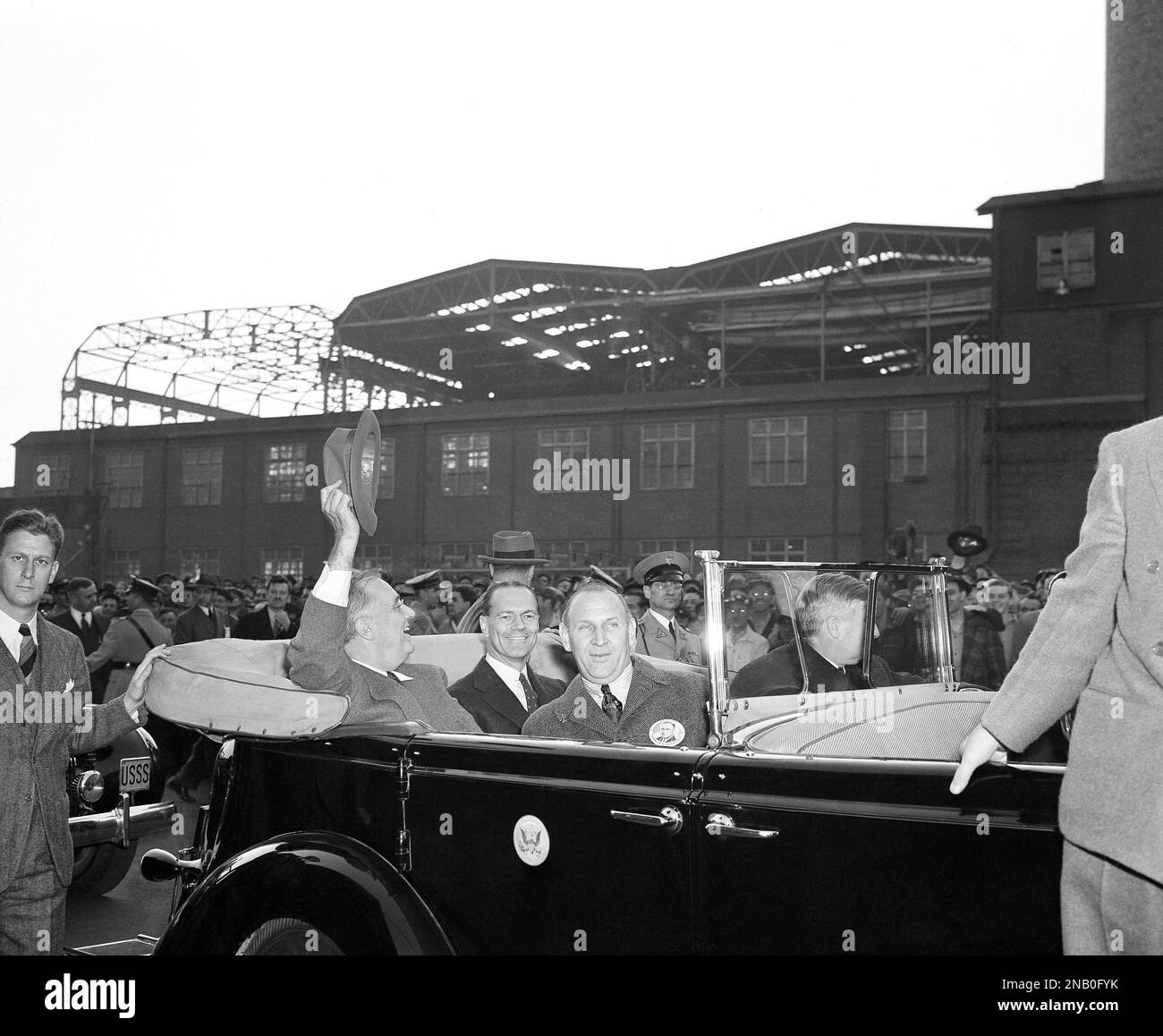 President Franklin D. Roosevelt (left, rear seat) visited the New York ...