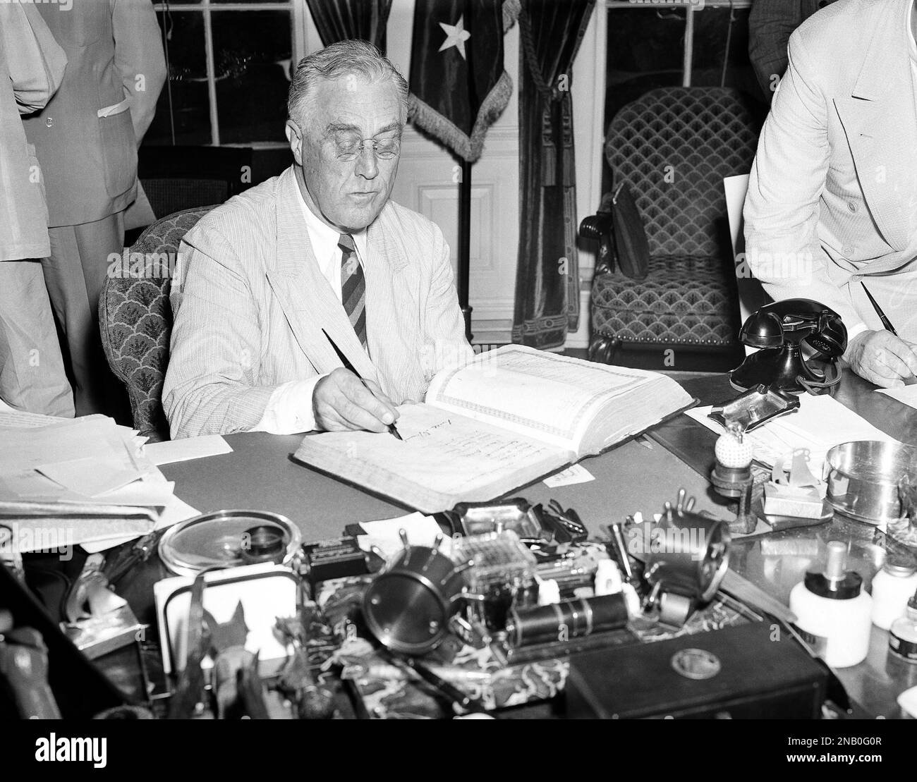 President Franklin D. Roosevelt signing the bible used in administering ...