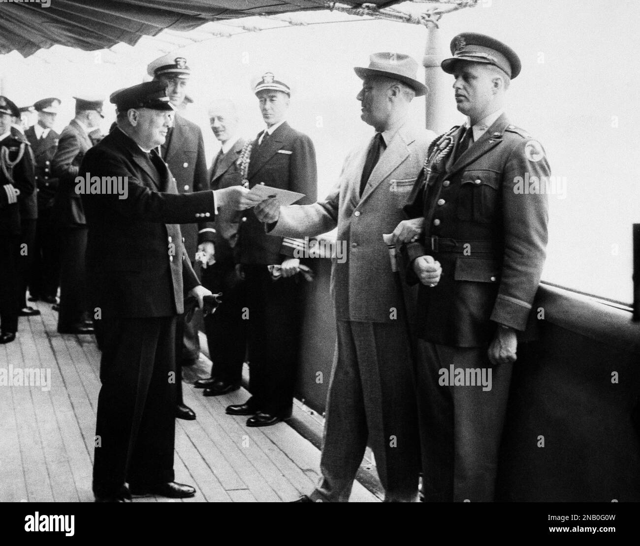 British Prime Minister Winston Churchill, left, presents President ...