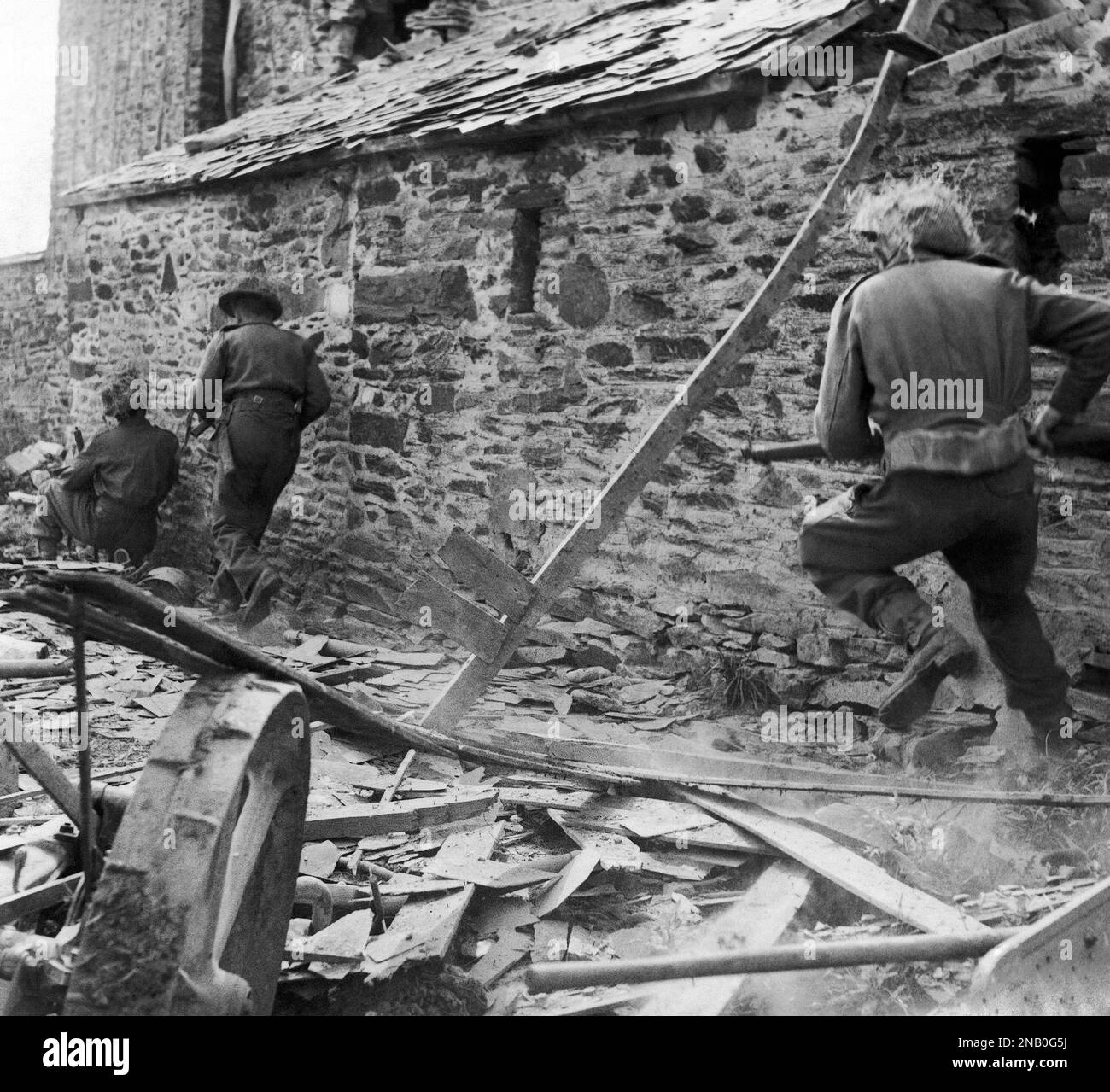 In this British Official Photo, enemy snipers give the Allied troops a ...