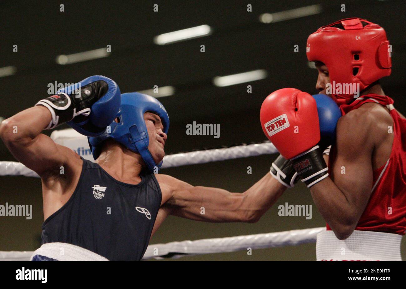 Dominican Republic's Dagoberto Aguero Arias, right, and Brazil's Juliao ...