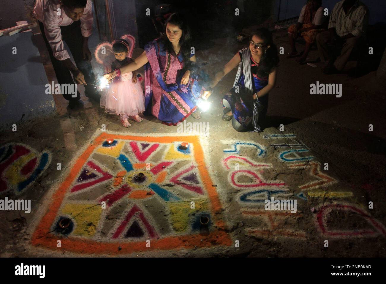 Pakistani Hindu girls hold firecrackers during Diwali, the Hindu ...