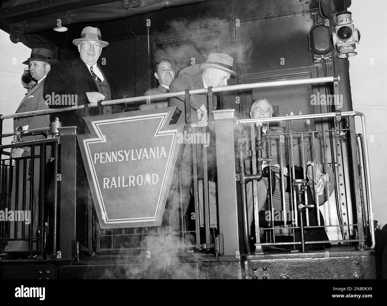 U.S. President Franklin D. Roosevelt shown seated on rear platform of ...
