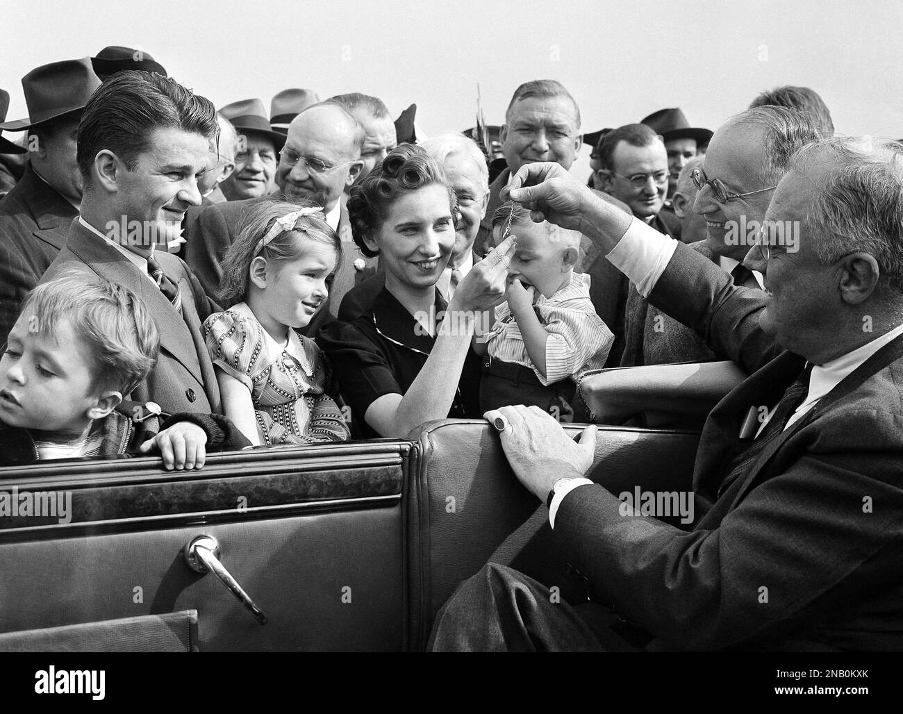 U.S. President Franklin D. Roosevelt presents to the Churchfield family ...