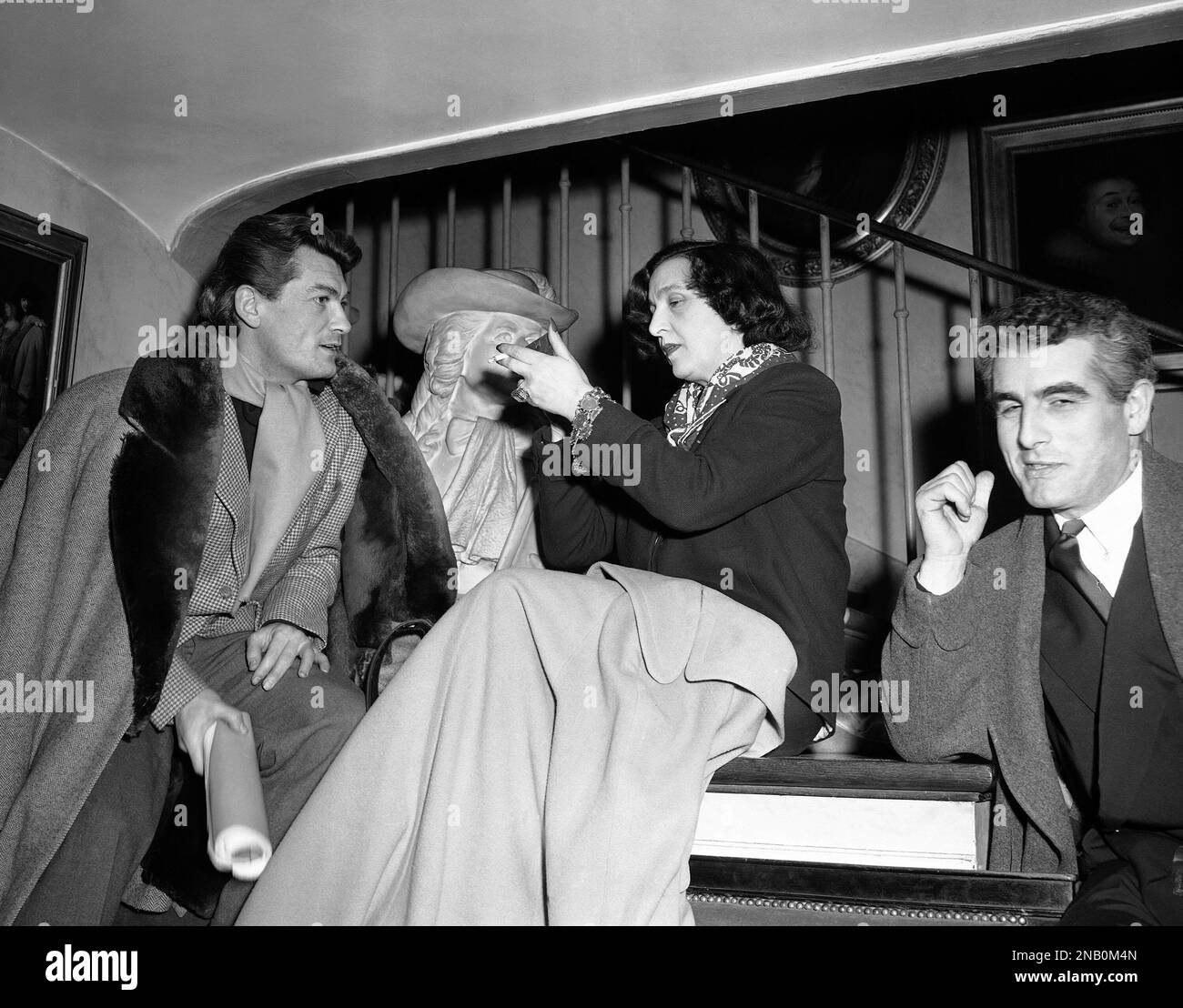 French actor Jean Marais, left, is seen with cast members of the play ...