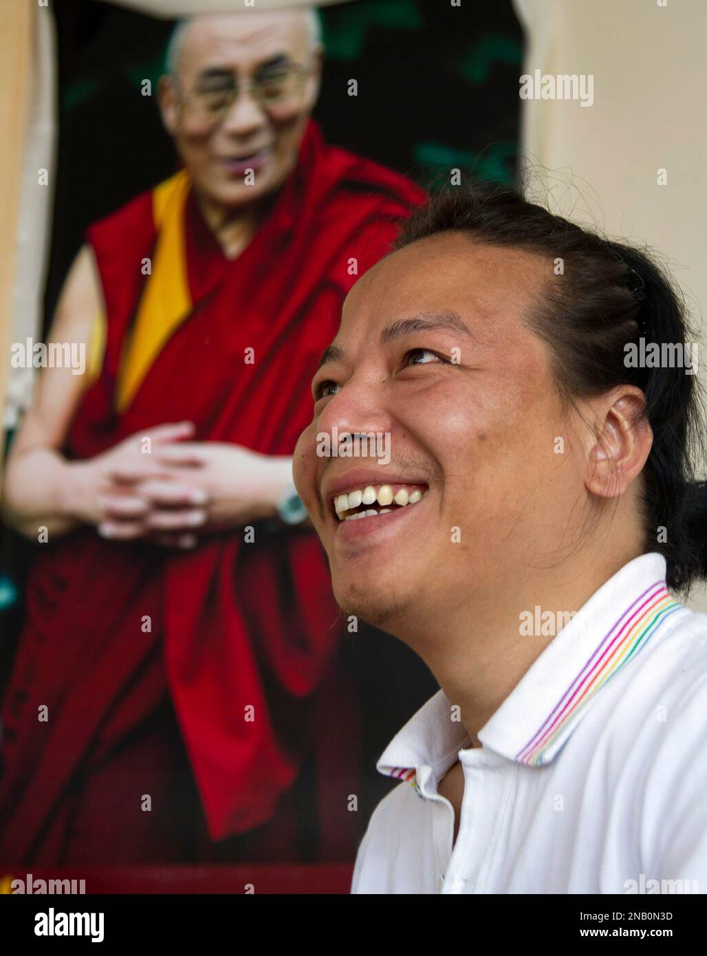 Tenzing Rigdol, a 29-year-old Tibetan artist from New York, sits in ...