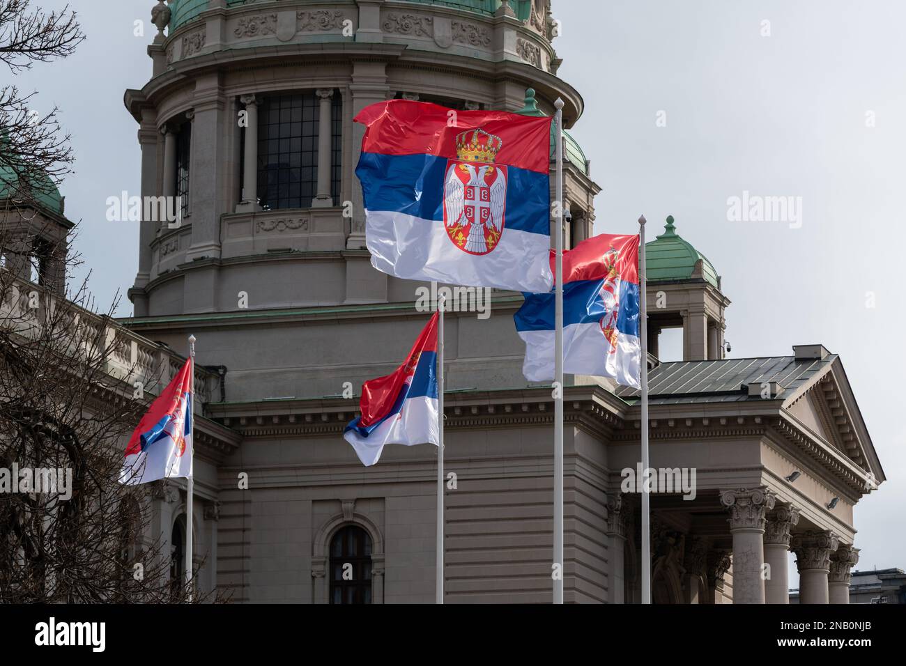 Serbian flags flutter in wind in front of National Assembly in Belgrade ...