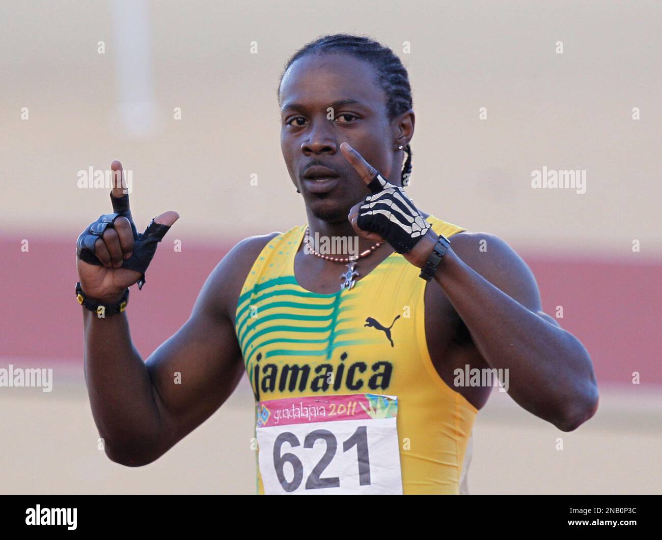 Jamaica's Lerone Clarke celebrates after winning the men's 100m final ...