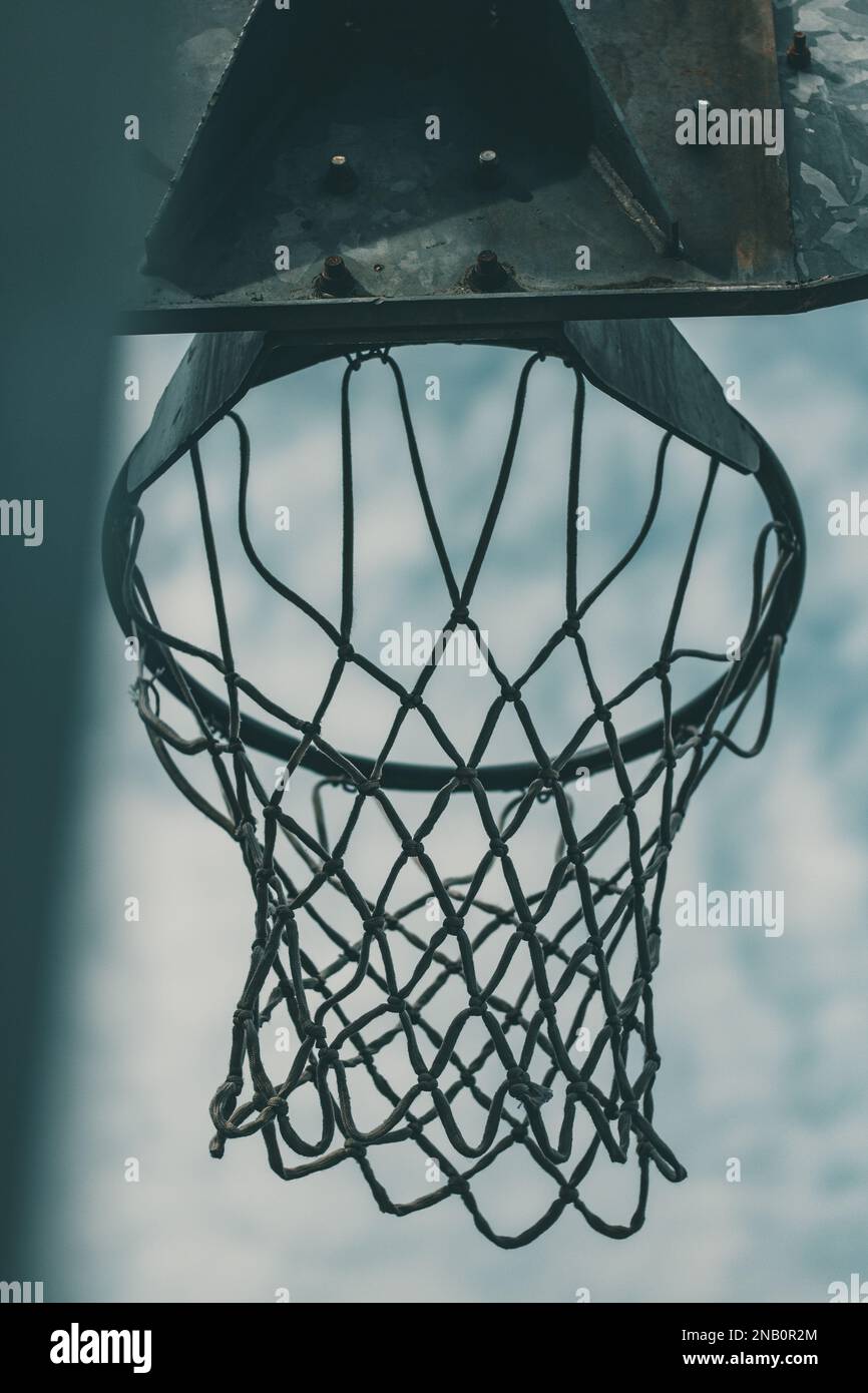 An old basketball hoop at the playground Stock Photo - Alamy