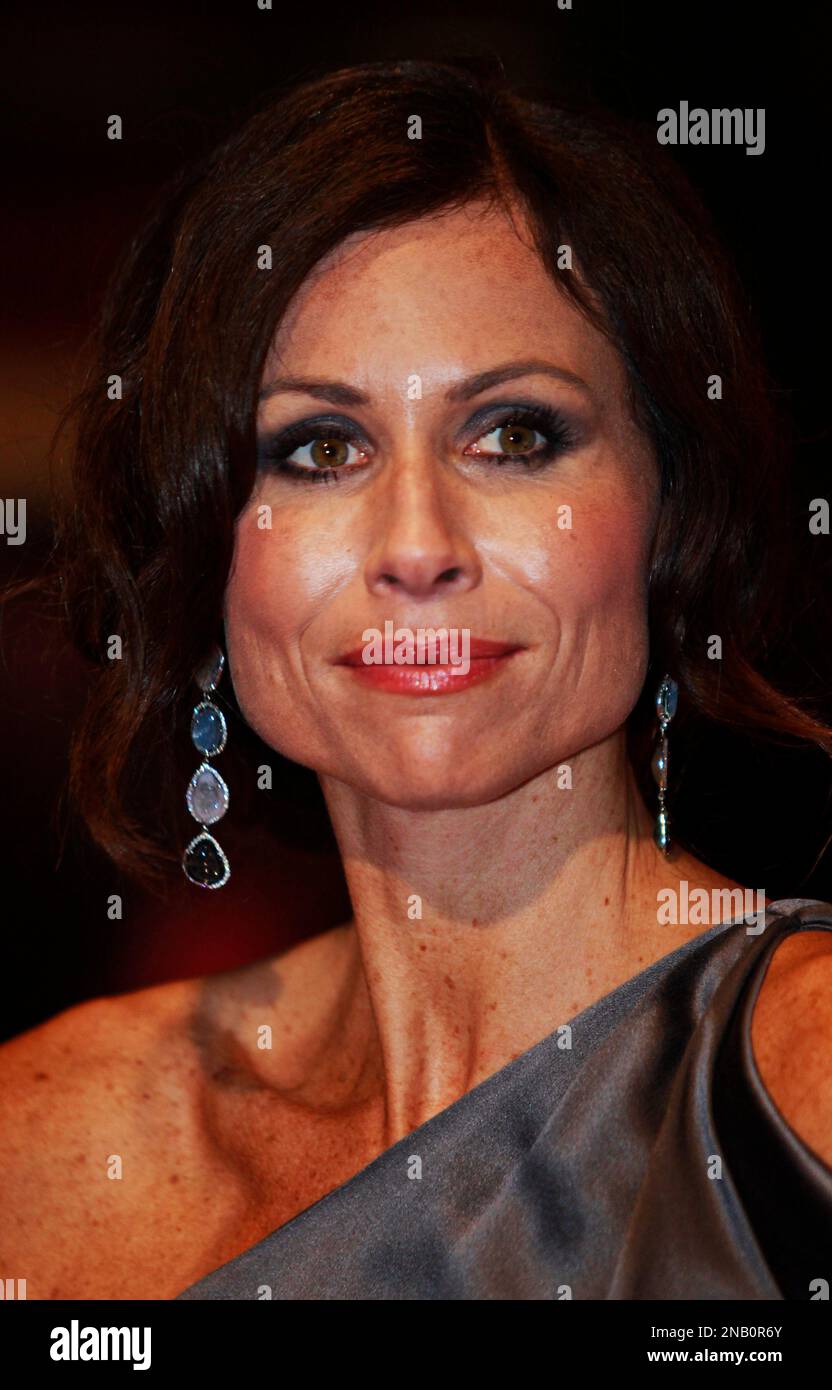 Actress Minnie Driver poses for the photographers as she arrives for ...