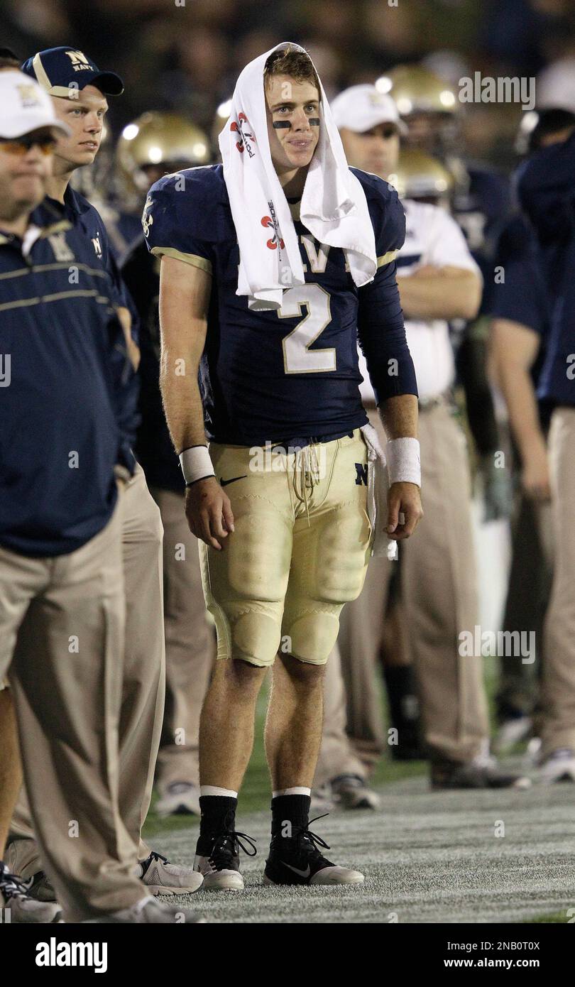 Navy quarterback Kriss Proctor (2) watches action from the sideline ...