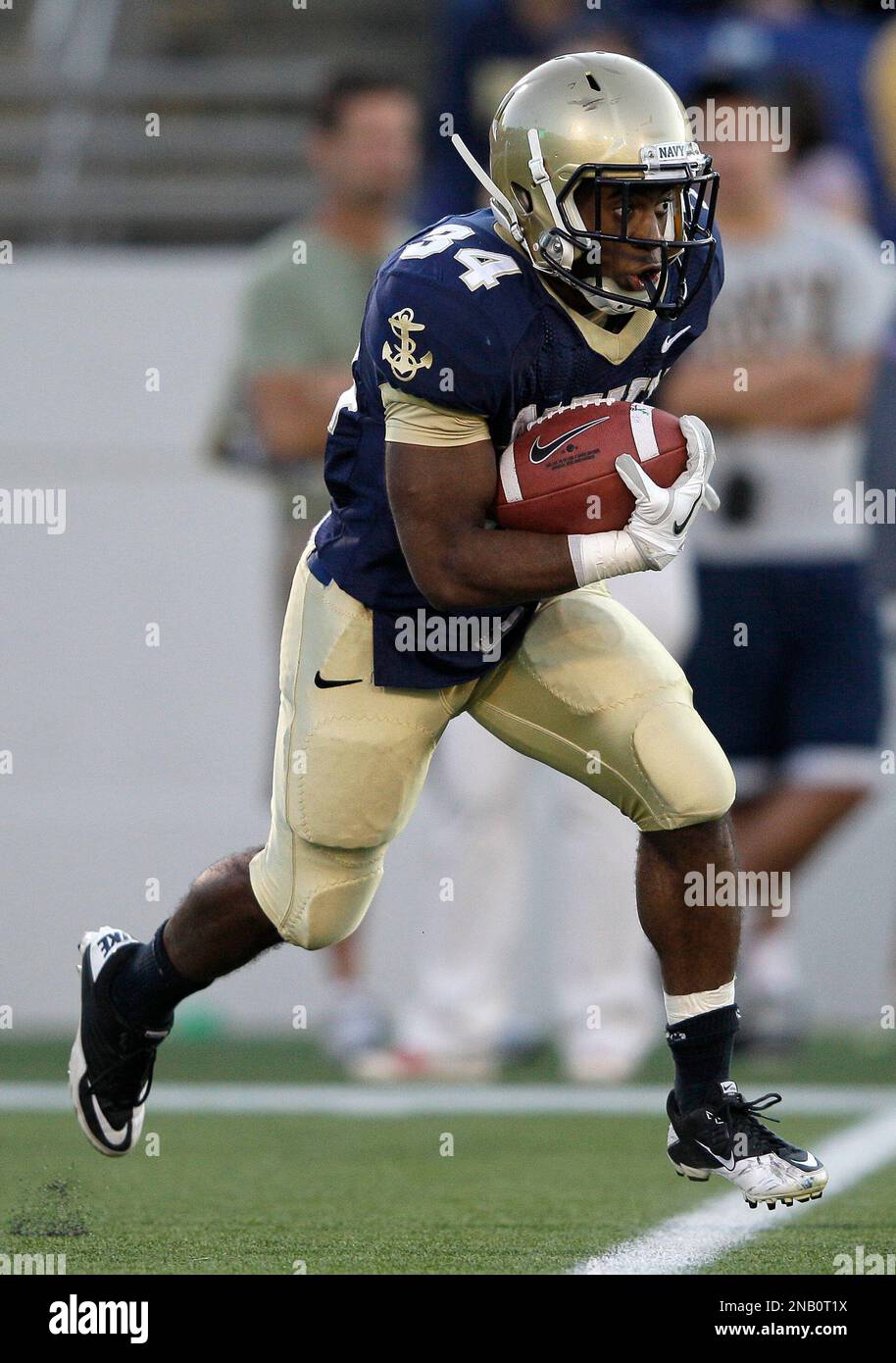 Navy running back Marcus Thomas rushes against Southern Miss in the ...
