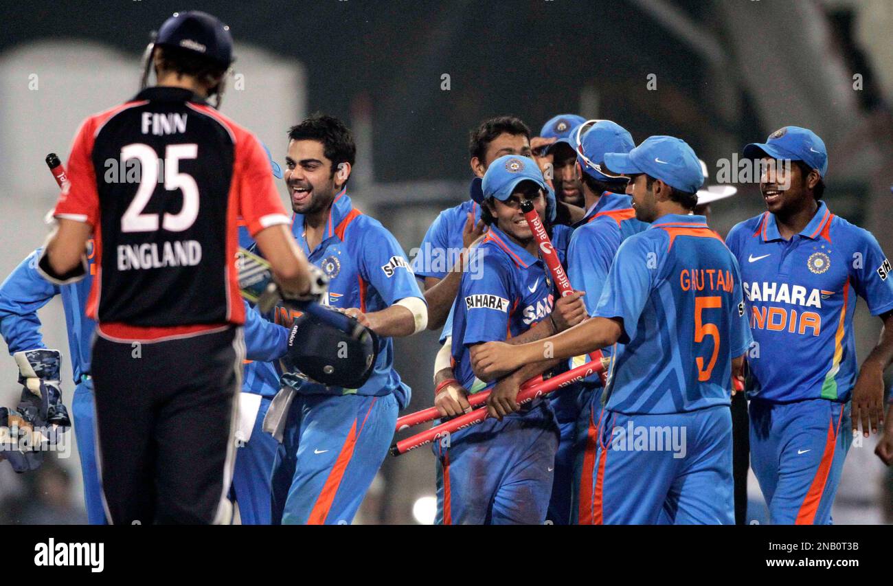 Indian cricket team members celebrate after winning against England ...