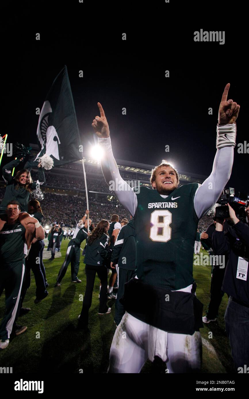 Michigan State quarterback Kirk Cousins celebrates following a 37-31 ...