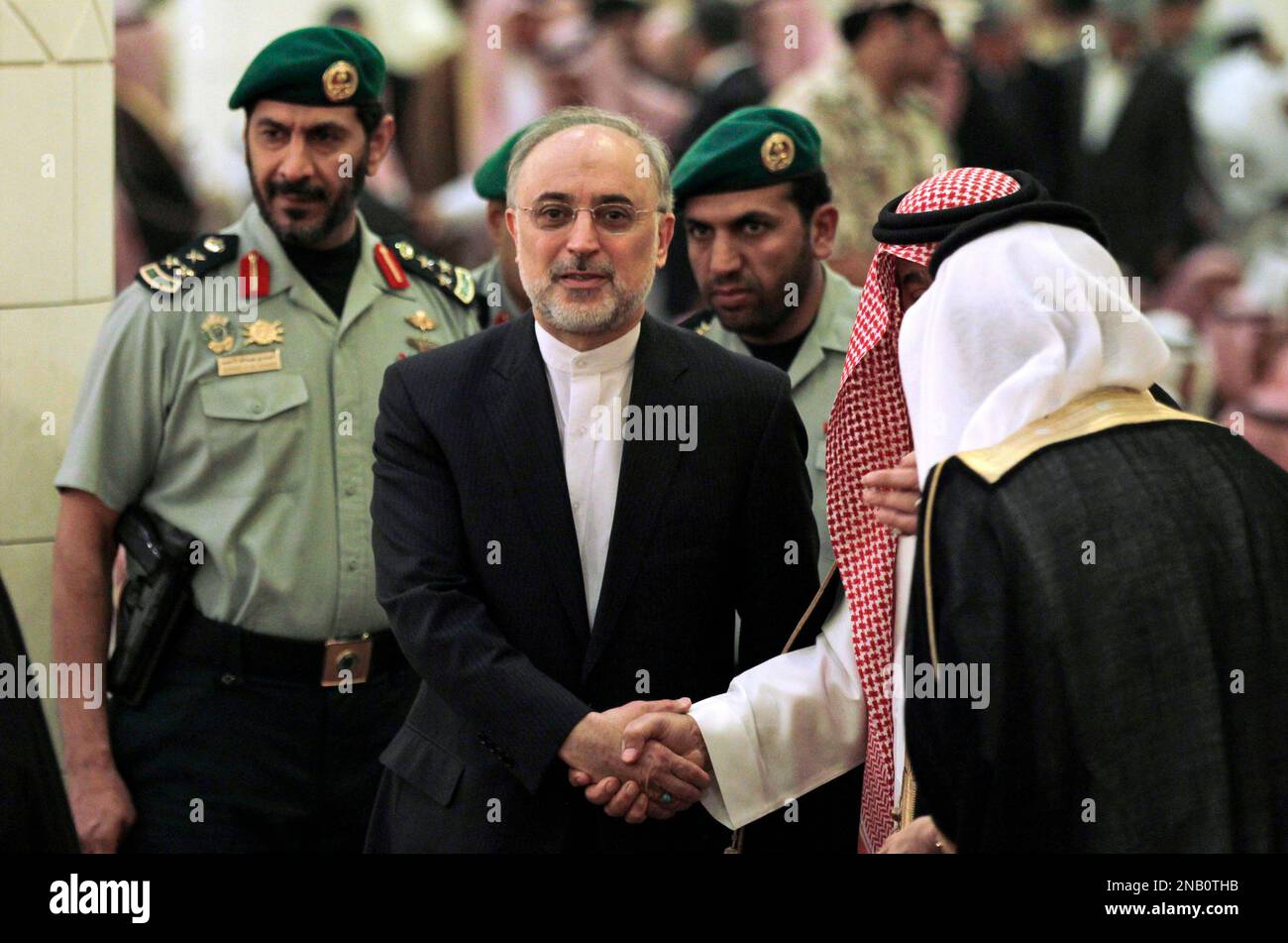 Iranian Foreign Minister Ali Akbar Salehi, center, arrives for the ...